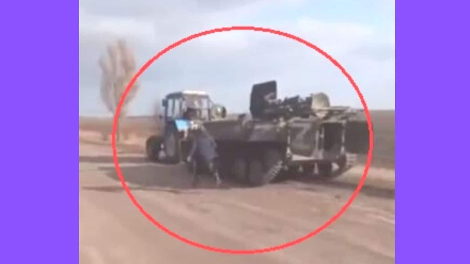 Ukrainian farmer steals Russian tank being pulled by a tractor ...