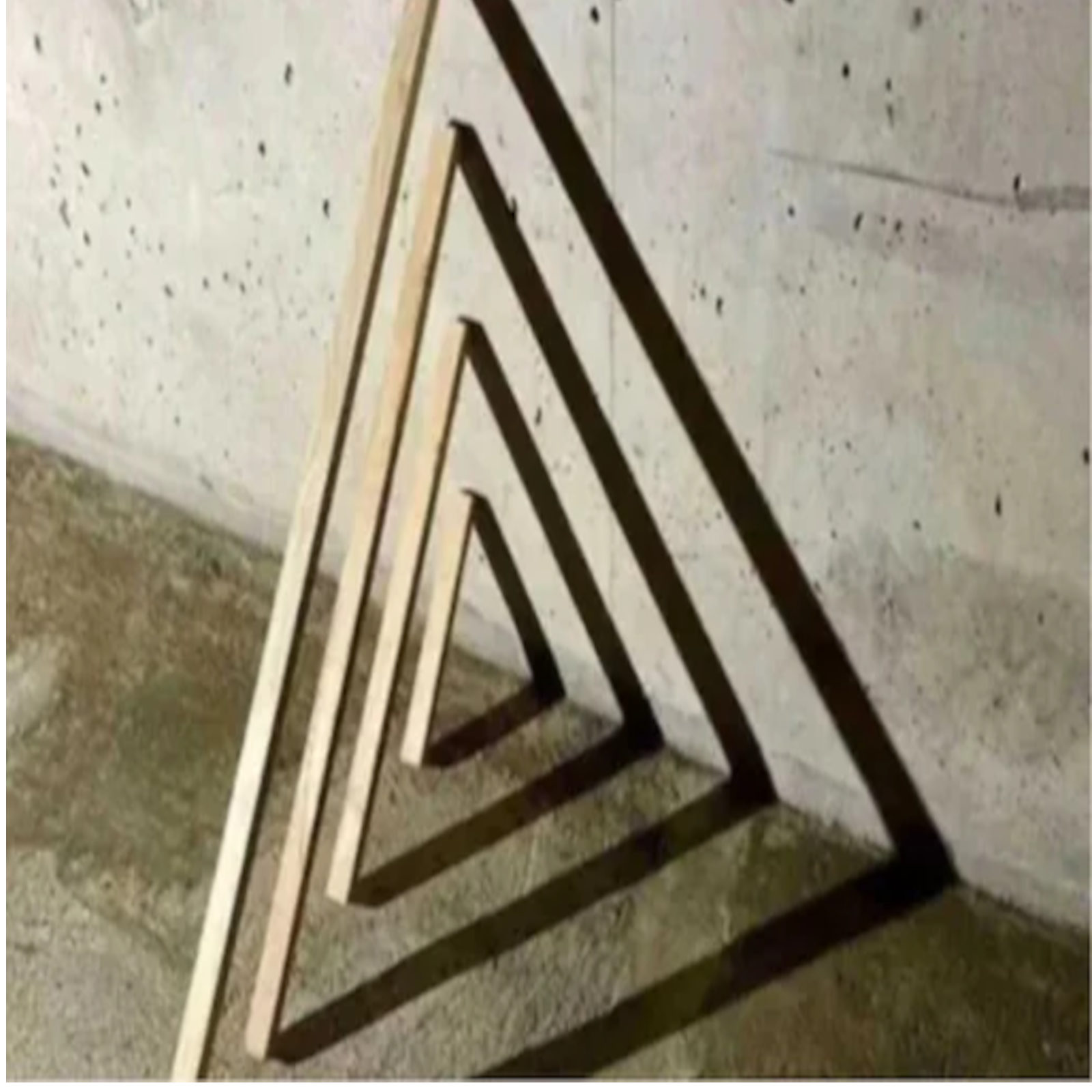optical illusion this shadow play of wooden sticks is leaving the ...