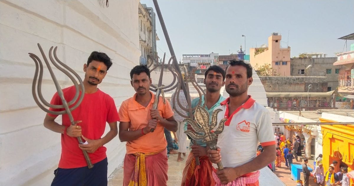 Panchshul is lowered from the top of the temple before shivratri in ...