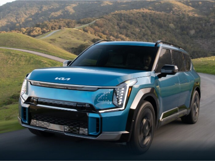 Kia ev9 electric suv unveiled electrocutes model with 10 lakh volts ...