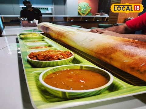 3.5 feet long dosa is available here in Bhopal. Two to three people can ...