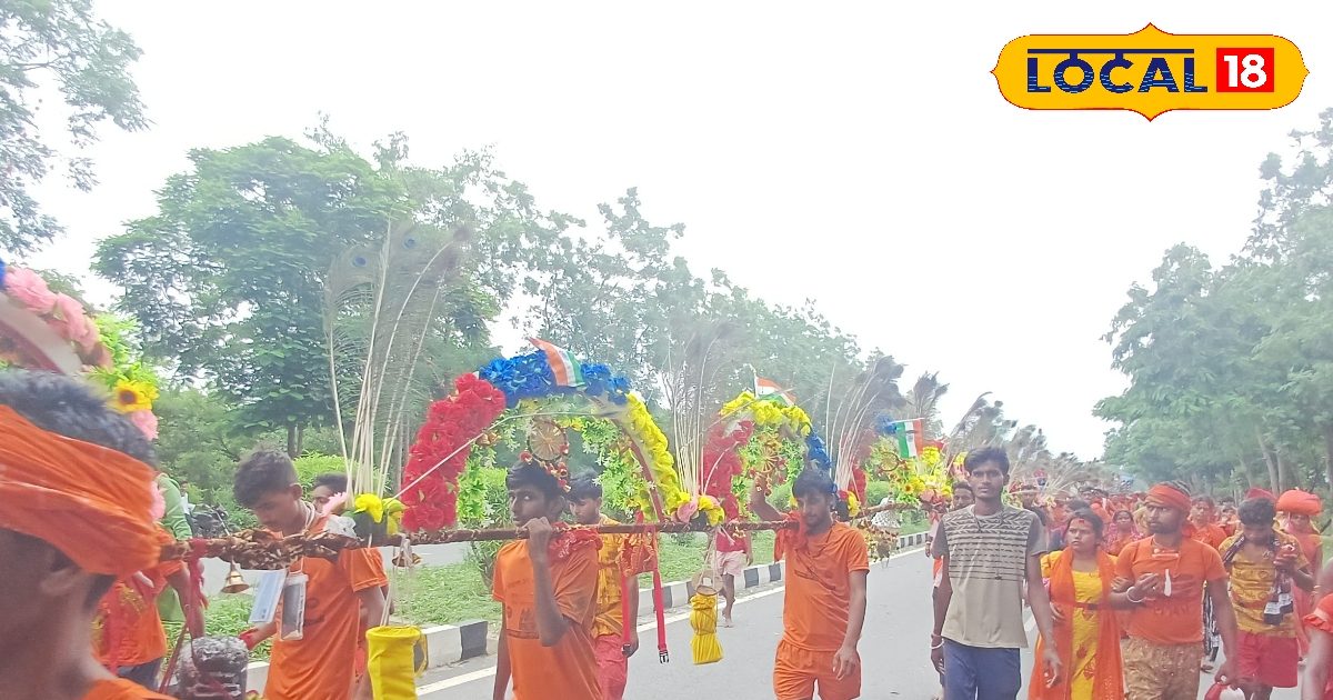 A Kanwar which is lifted by 75 Shiva devotees. Every year the length of ...