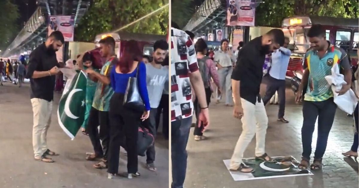 Indian boys stick Pakistani flag stickers on road people walk on them ...