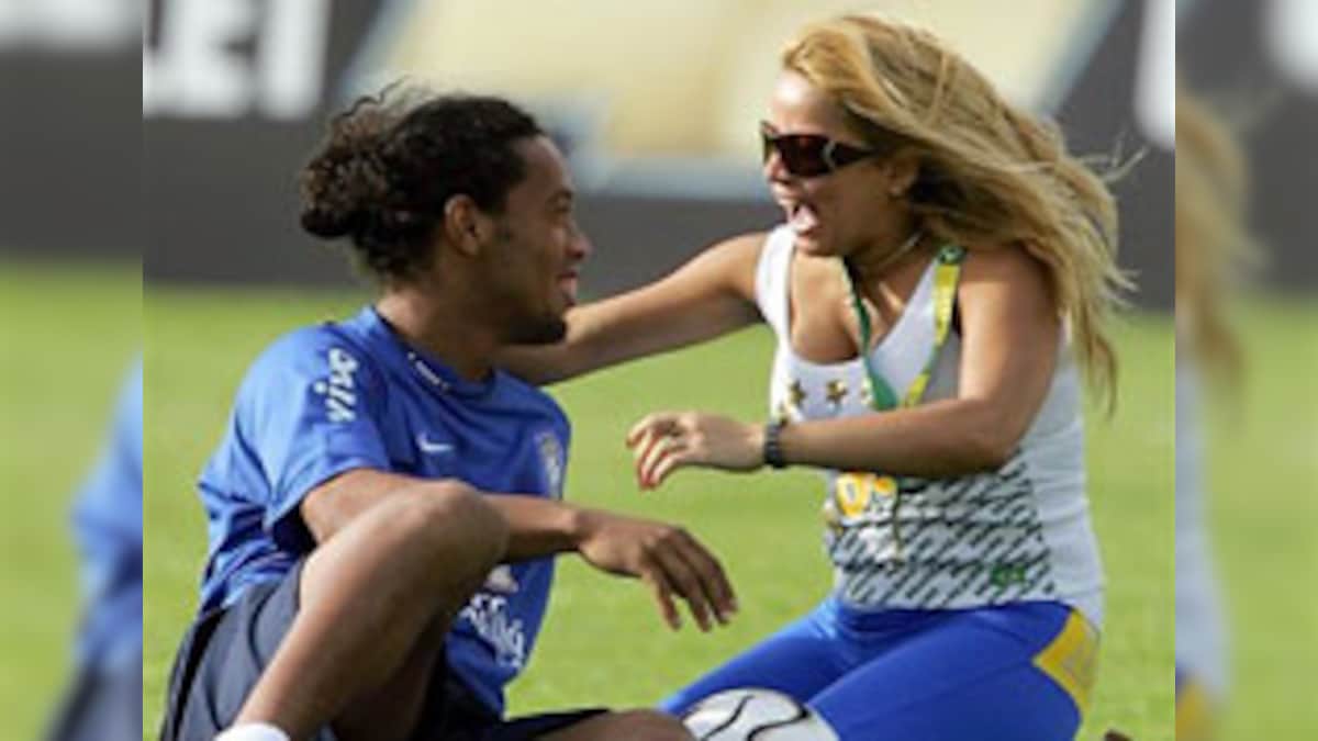 Woman pitch invader hugs Ronaldinho - News18