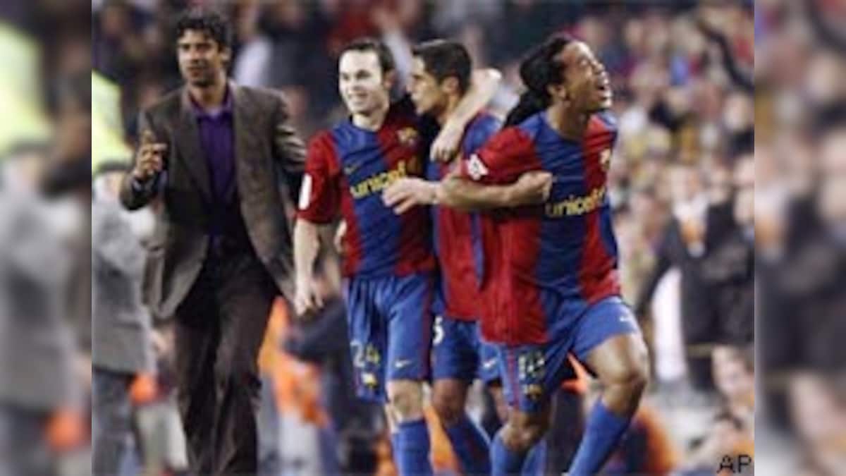 Barcelona score their way to top