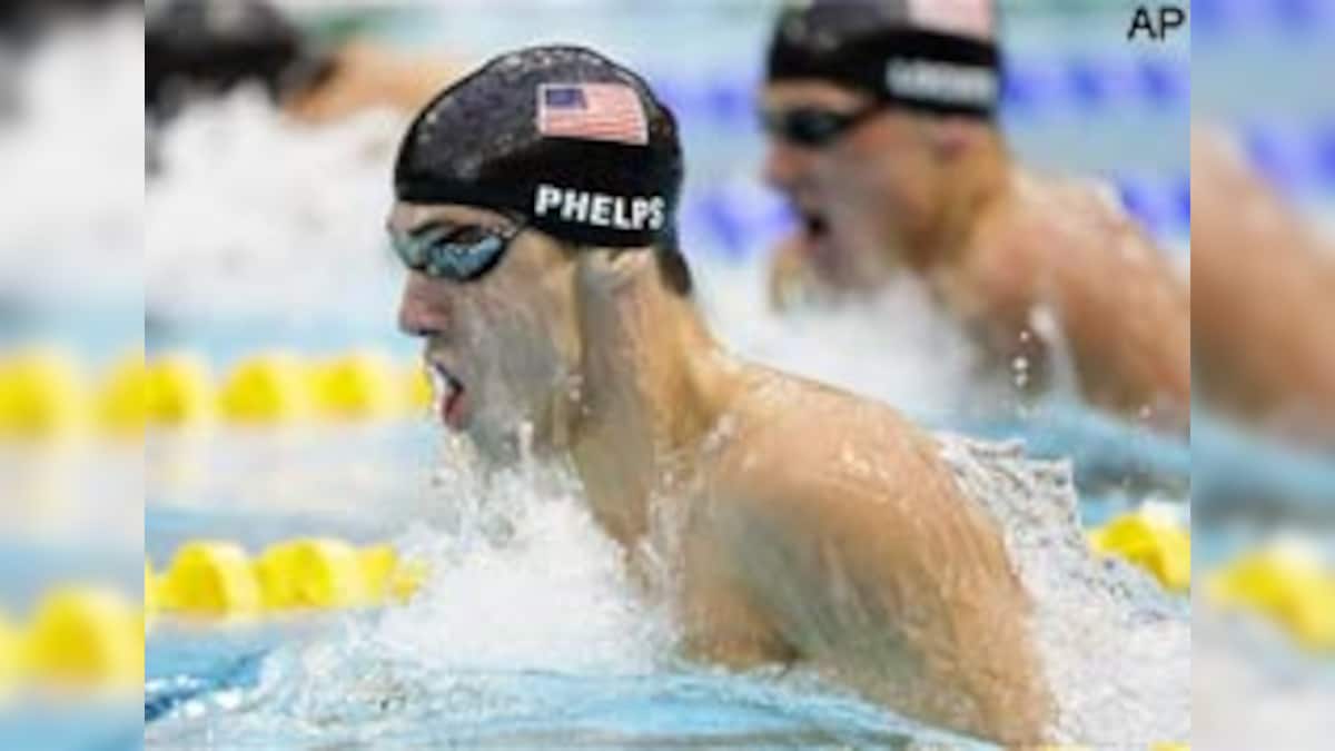 Phelps makes history, wins 8 golds | Golden moments - News18