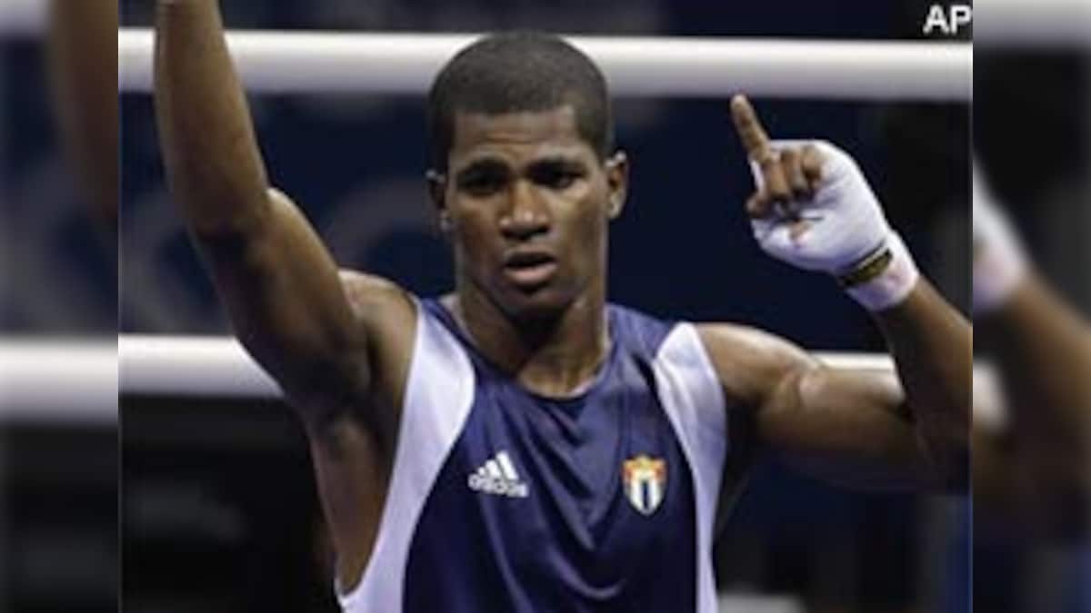 Cuban boxers close in on historic eight golds