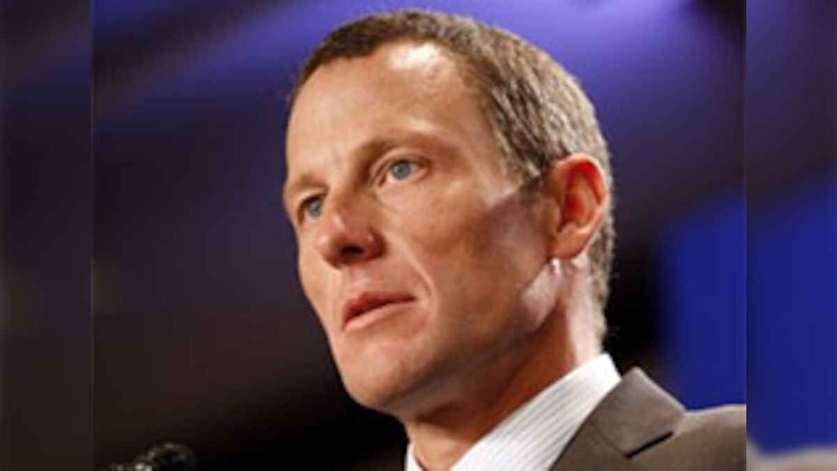 Tour director has anxious wait over Armstrong - News18