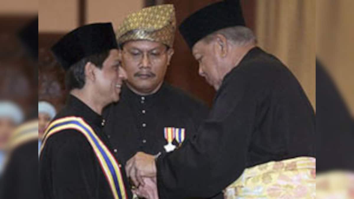 In Pics: Shah Rukh Khan 'Knighted' in Malaysia - News18