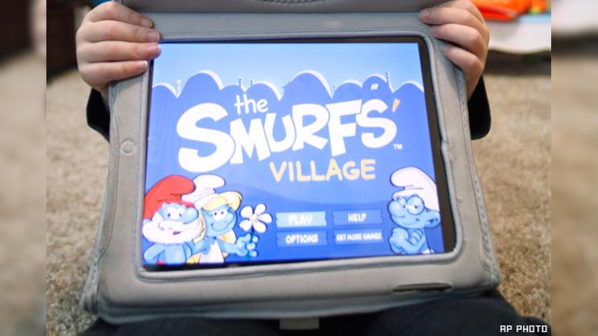 Smurfs' Village adds Smurfberries warning - News18