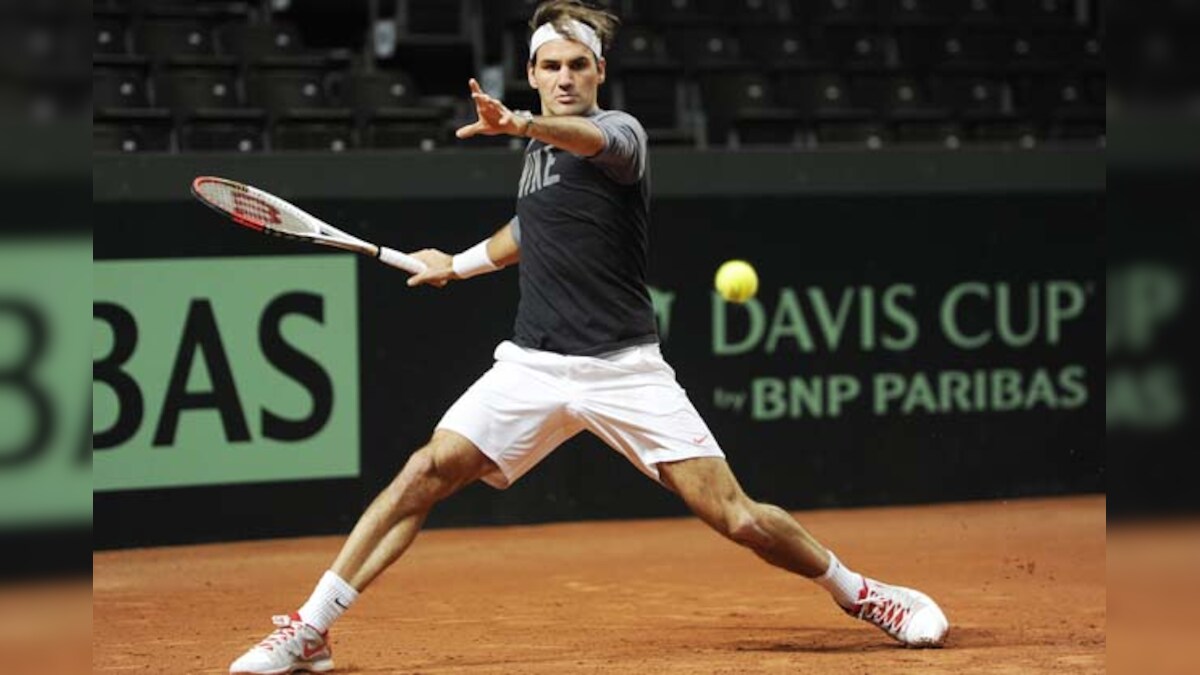 Davis Cup: US win after Federer doubles loss - News18