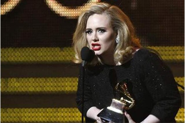 Adele triumphs at Grammys with six wins - News18