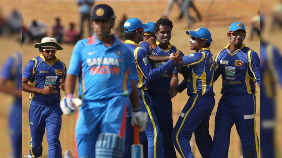 Dhoni points finger at Hambantota pitch - News18