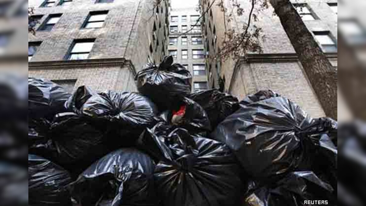 Garbage piles, Bangalore city stinks - News18