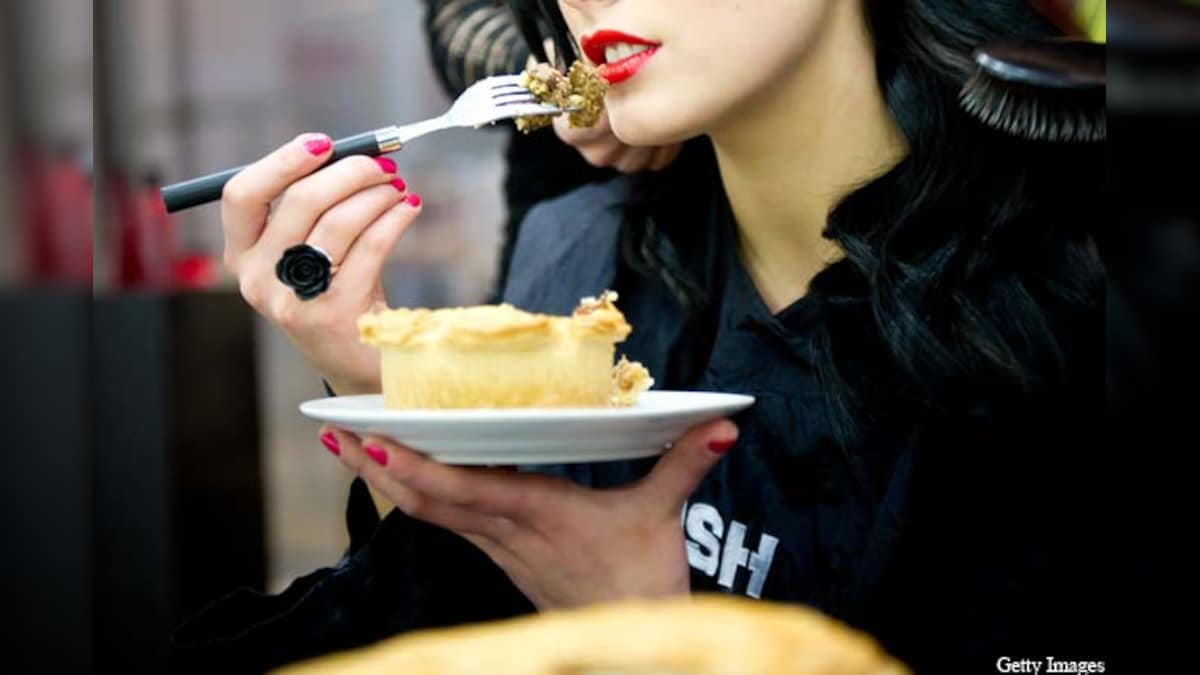 Noisy eating, messy colleagues top office irritants - News18