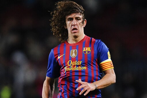 Captain Puyol back in training for Barcelona - News18