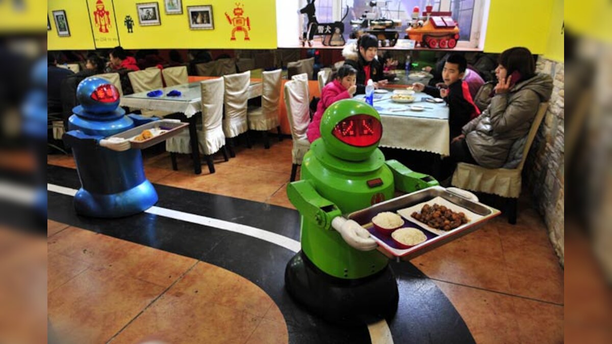 A Chinese restaurant where robots cook and serve food - News18