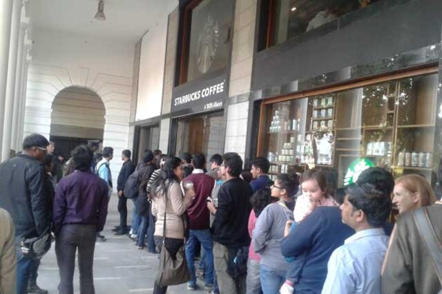 Long queues, but smiles welcome Starbucks to the heart of Delhi - News18