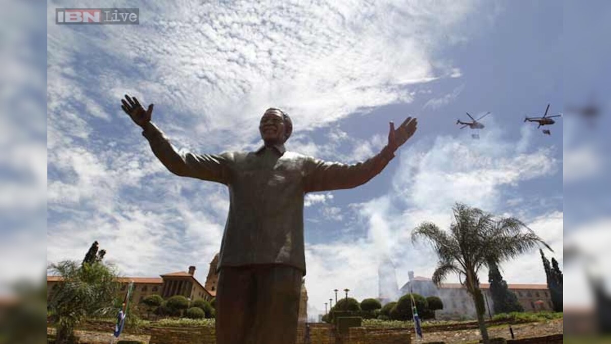 Day after burial, South Africa unveils Nelson Mandela 'unity' statue ...