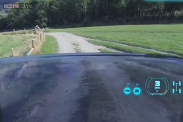 Land Rover debuts invisible car technology that makes the bonnet appear ...