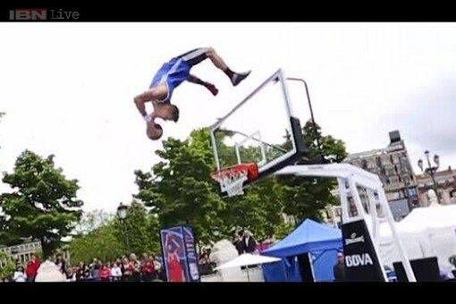 Watch this viral YouTube video of a crazy basketball acrobat dunking ...