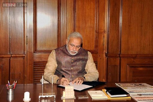 Photos: Inside Prime Minister Narendra Modi's wood-panelled office. His ...