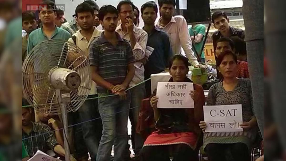 NSUI activists stage dharna against CSAT at Jantar Mantar - News18