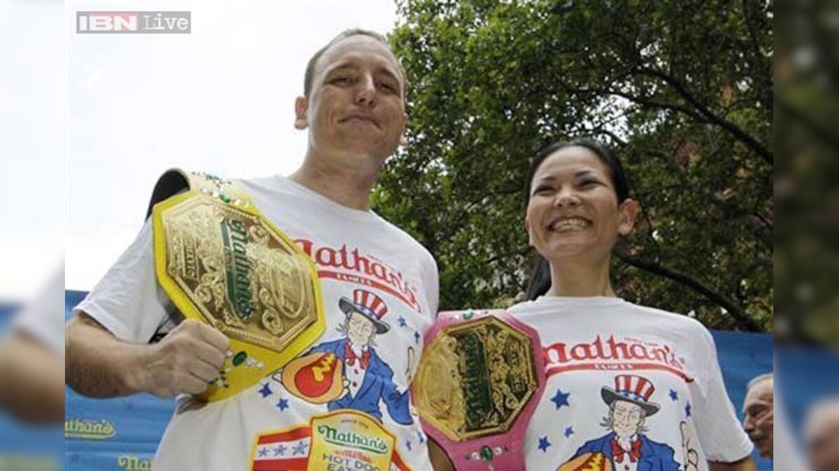 Joey Chestnut gets mustard yellow winner's belt and a fiancee at the ...