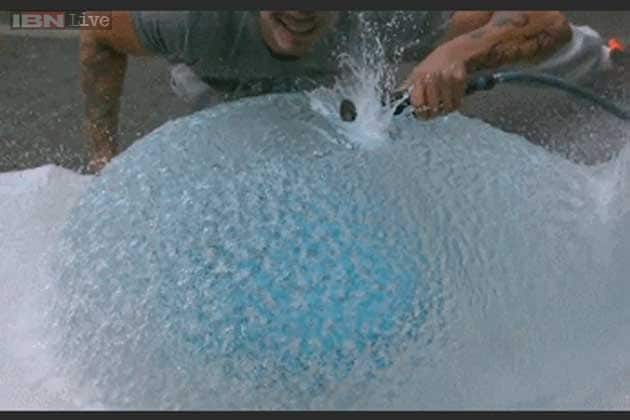 Watch: Neat! This is exactly how a water balloon bursts in slow motion