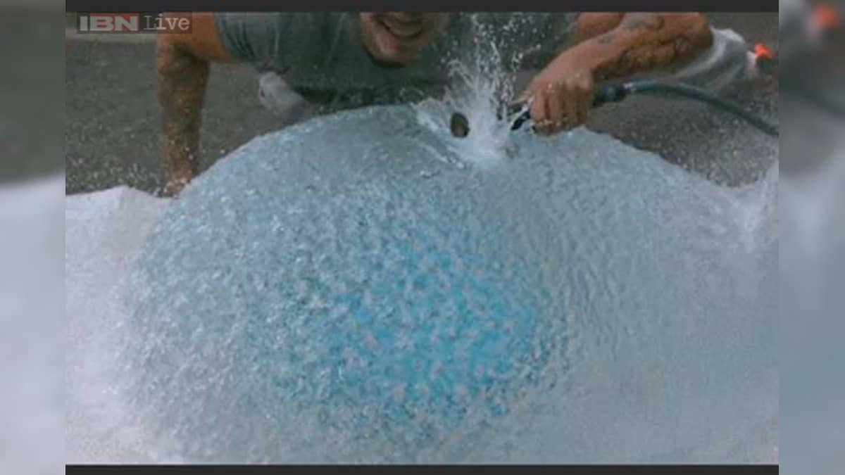 Watch: Neat! This is exactly how a water balloon bursts in slow motion