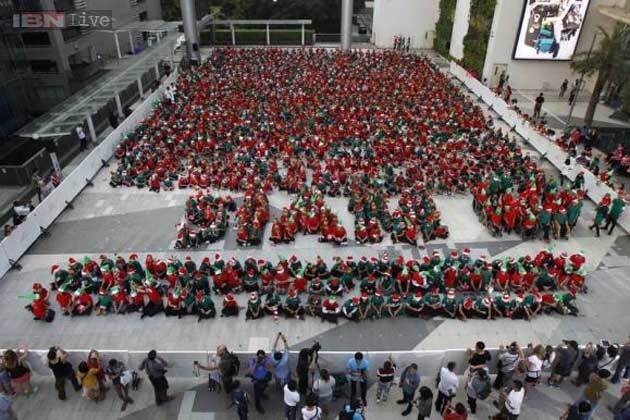 Santa's little helpers break the Guinness World Record for the largest ...