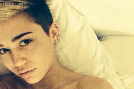 Miley Cyrus posts a disturbing selfie of herself with blood dripping ...