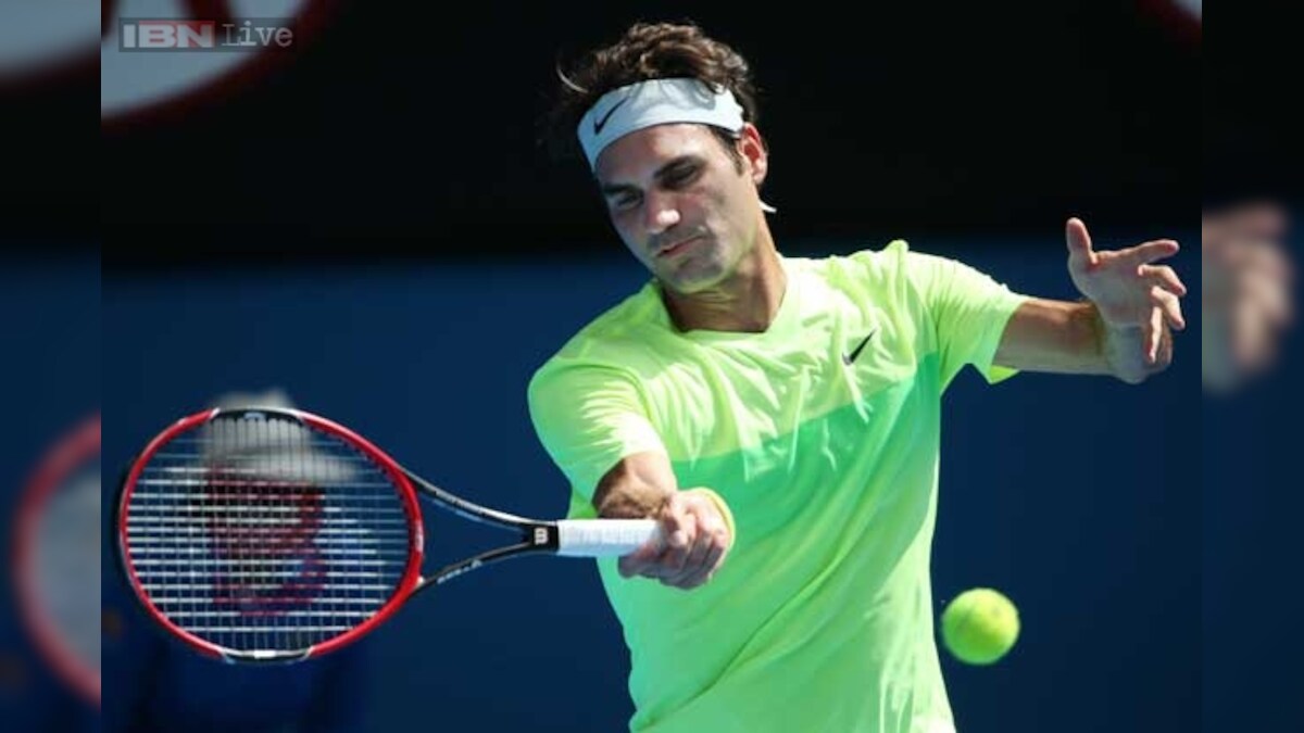 Roger Federer overcomes sore hand to advance at Australian Open - News18