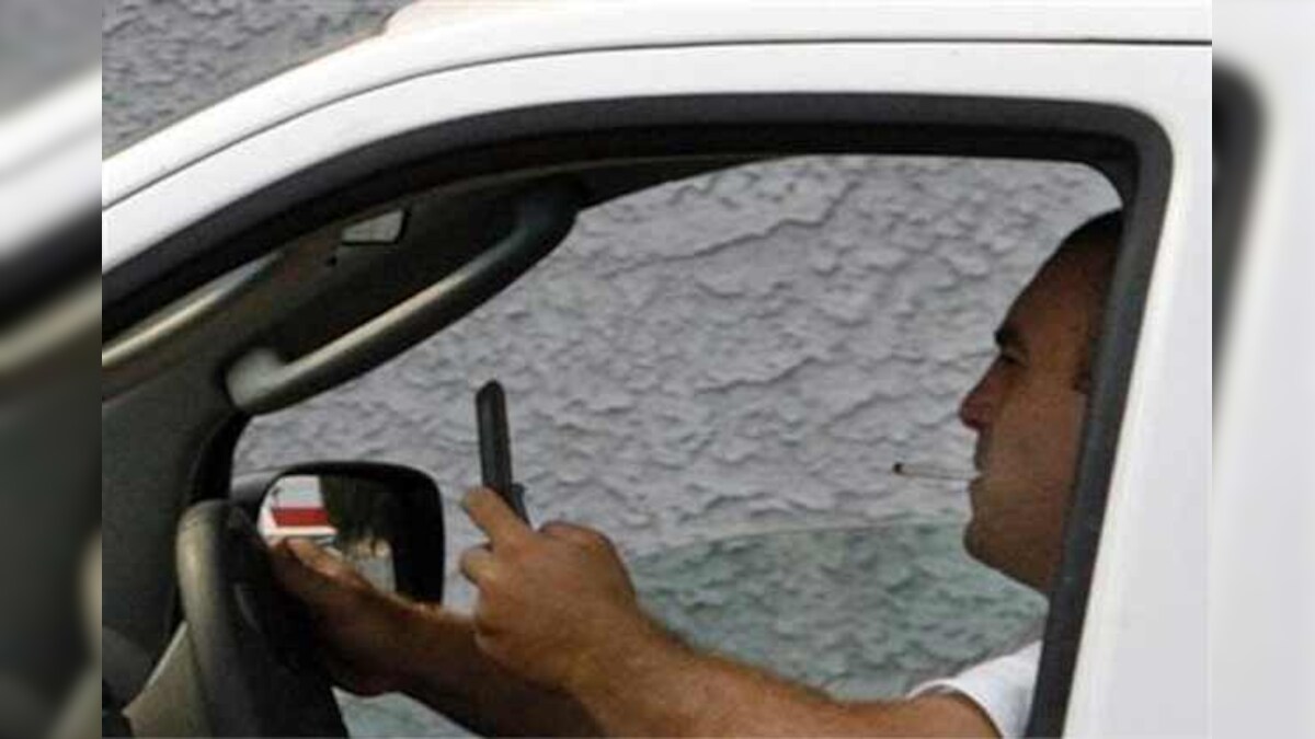 Here's why people text while driving - News18