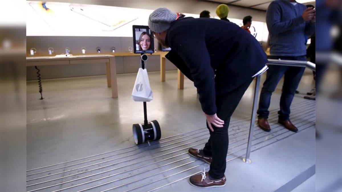 Woman sends 'iPad robot' to queue for new Apple iPhone