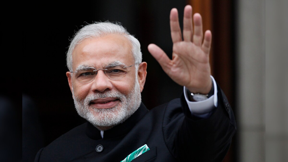 PM Modi signs national flag, sparks controversy - News18