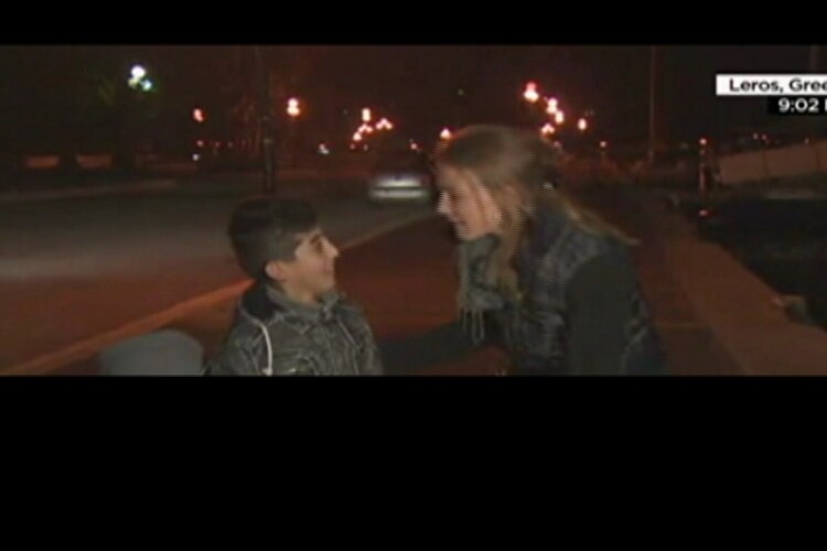 Greek boy interrupts CNN correspondent while she was reporting live on ...