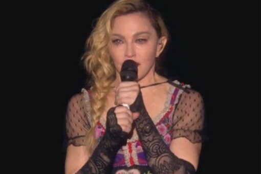 Madonna cries onstage as she pays tribute to Paris victims - News18