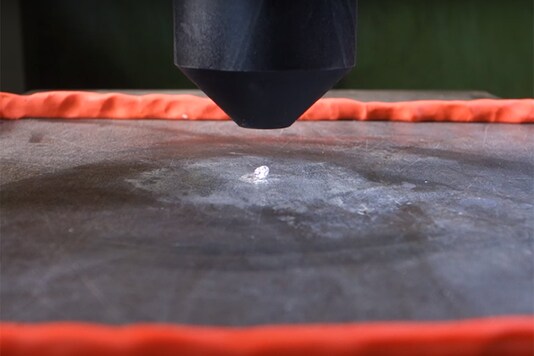 This Video of a Diamond Breaking Under Pressure is Pretty Awesome!