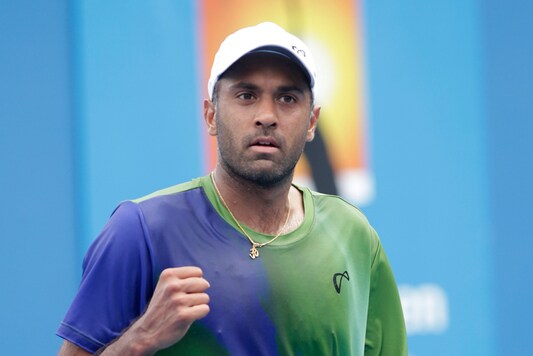 Defending Champ Ram Advances on Newport's Grass Courts