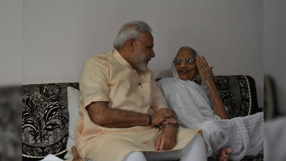 Narendra Modi Takes Blessings of His Mother on 66th Birthday - News18