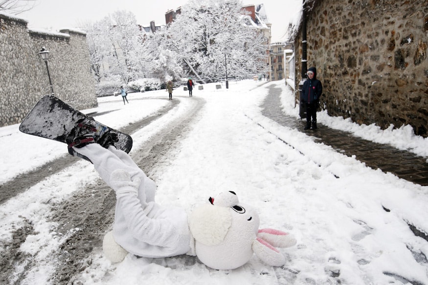 Skiers are Soaring Through the Streets of Snow Blanketed Paris - News18