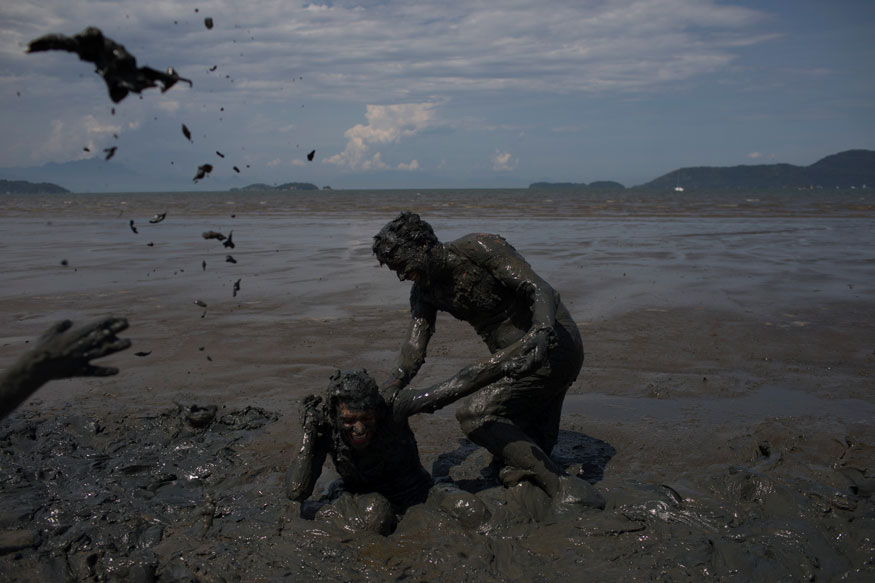 Revelers Getting Down and Dirty at Brazil's Mud Party