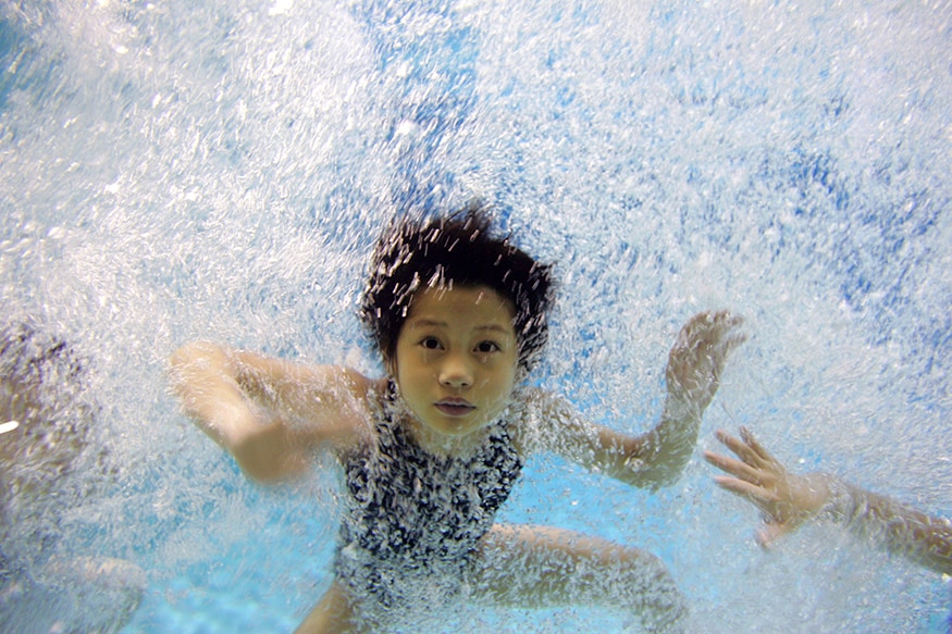PHOTOS: Kids Undergo Extreme Training at China's Gymnasiums - News18