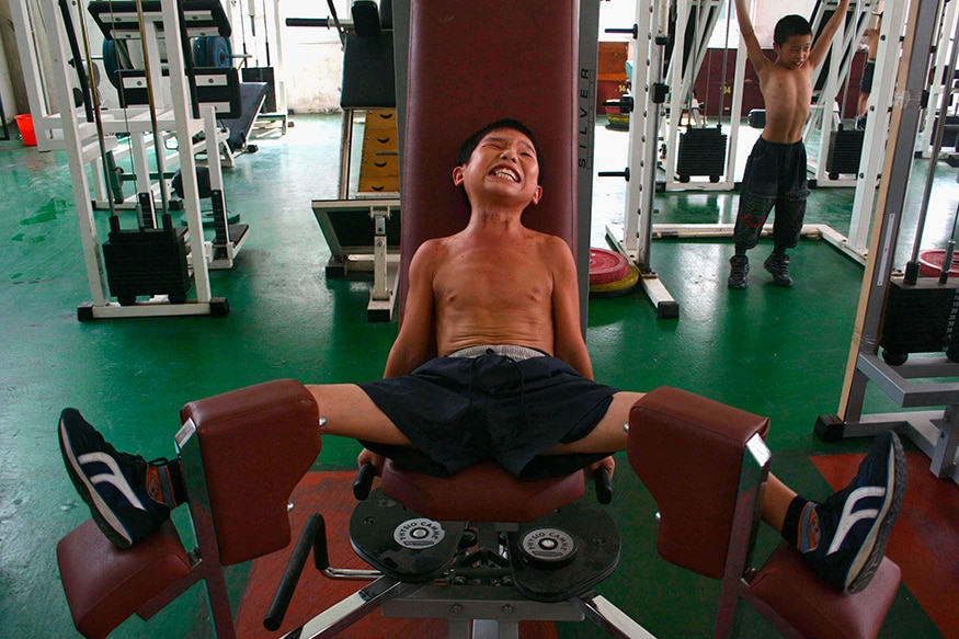 PHOTOS: Kids Undergo Extreme Training at China's Gymnasiums - News18
