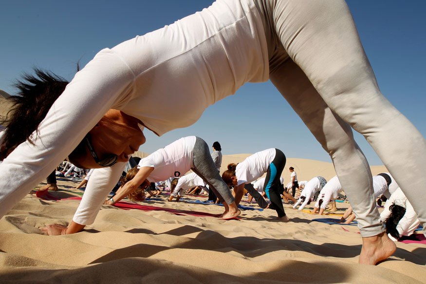 PHOTOS: Yoga Enthusiasts Practice Yoga in Mexico's Desert - News18