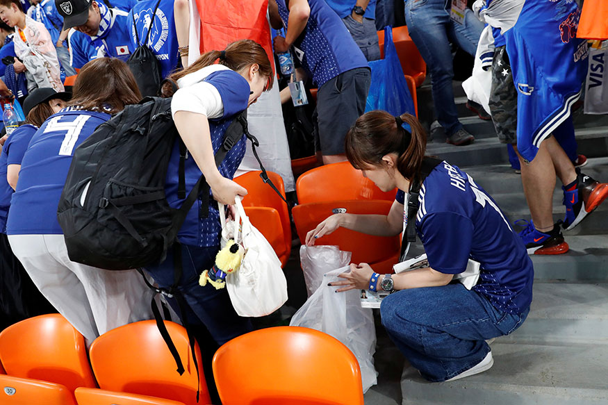 Tearful Japan Fans Clean Stadium Despite Defeat to Belgium