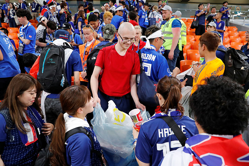 Tearful Japan Fans Clean Stadium Despite Defeat to Belgium