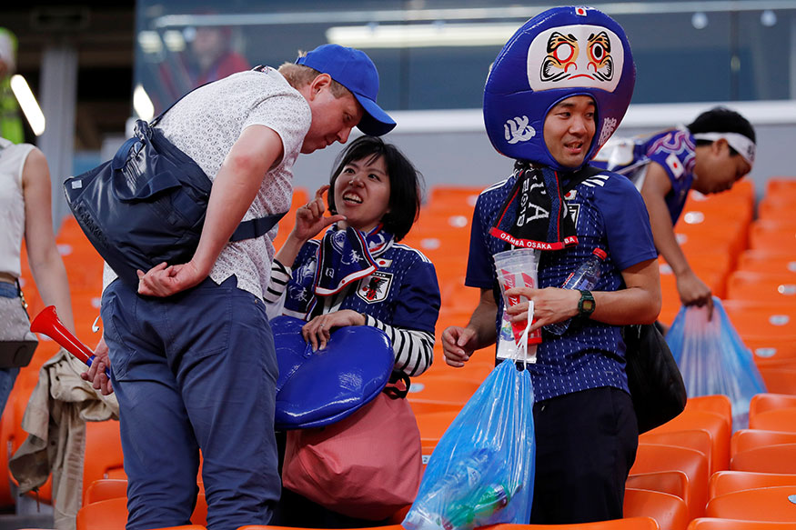 Tearful Japan Fans Clean Stadium Despite Defeat to Belgium - News18