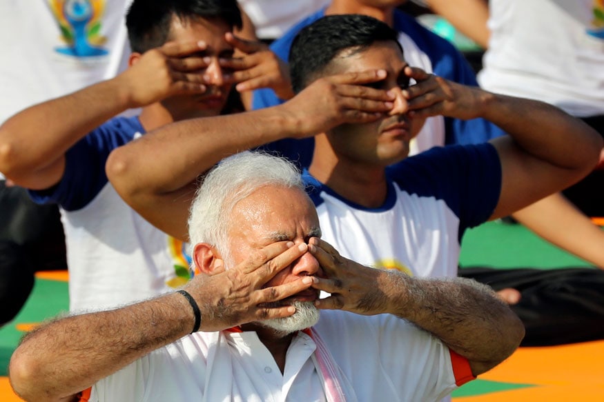 PM Modi Leads 4th International Yoga Celebrations in Dehradun - News18